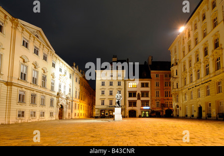 The magnificent Judenplatz at night, with the statue of famous German ...