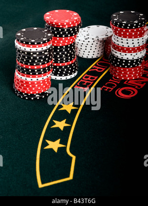 Poker Chips on gaming table Stock Photo - Alamy