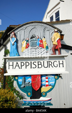 The Norfolk coastal village of Happisburgh with village sign and white ...