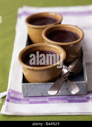 Small pots of chocolate cream dessert Stock Photo - Alamy