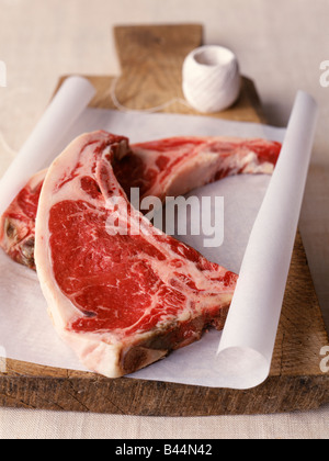 Raw beef chops Stock Photo - Alamy