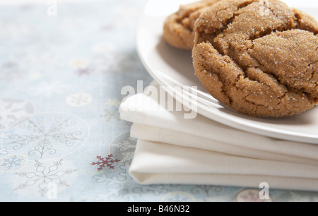 Christmas still life. homemade ginger biscuits, cane candy, on a wooden ...