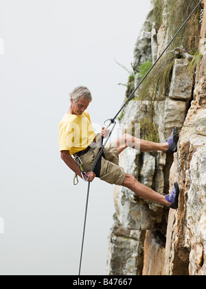 A person abseiling Stock Photo - Alamy