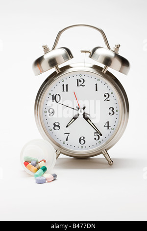 Pill, tablet as alarm clock. Time to take medicine, concept. 3D ...