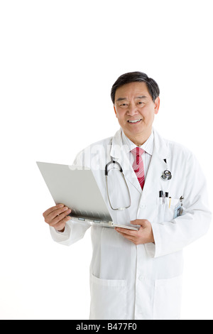 portrait old asian man doctor in gown with digital tablet Stock Photo ...