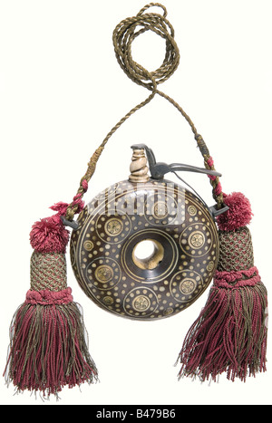 A German priming flask, circa 1590. Hemispherical body with inlays of ...