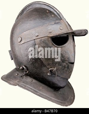 An Italian heavy burgonet, circa 1620. Two-piece, blackened heavy skull ...