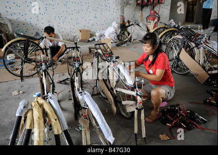 Factory workers at China Bicycle in Shenzhen in Guangdong Province ...