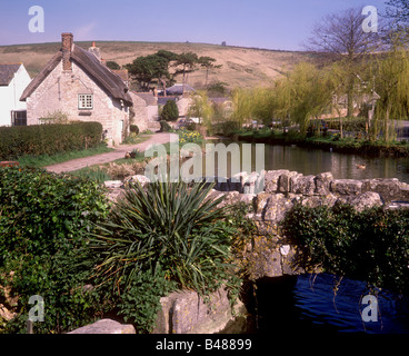 Cottages beside the pond in the village of Sherrington, near Warminster ...