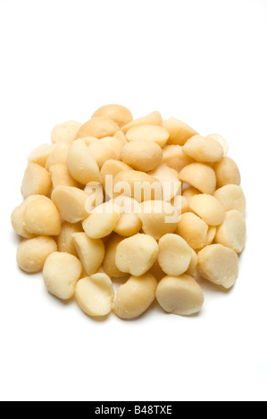 the most delicious macadamia nut on a yellow background Stock Photo - Alamy