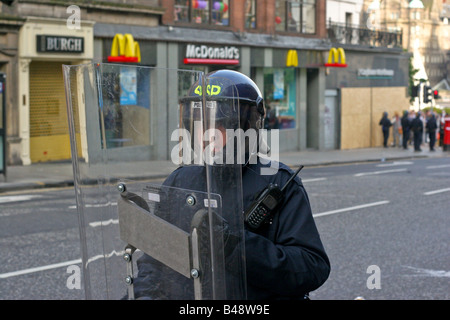 Riot policeman protecting Mcdonalds restaurant during G8 protests ...