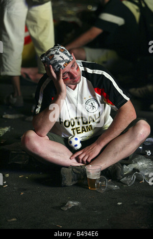 German football fan crying after the German defeat against Italy at the ...
