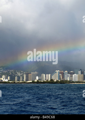 Rainbow over the Honolulu harbor area Stock Photo - Alamy