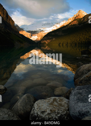 Mountains reflecting in a lake, Banff National Park, Icefields Parkway ...