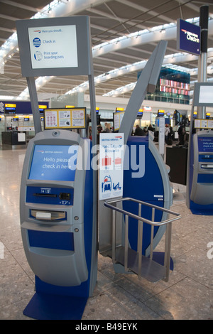 London Heathrow airport terminal 2 Self Service Check In terminal Stock ...