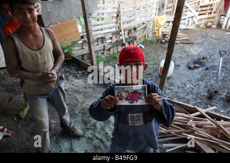 Roma gypsy boy at home in Share, a slum next to a rubbish dump on the ...