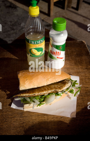 Balik Ekmek (fish bread sandwich) seller at the Galata Bridge in ...