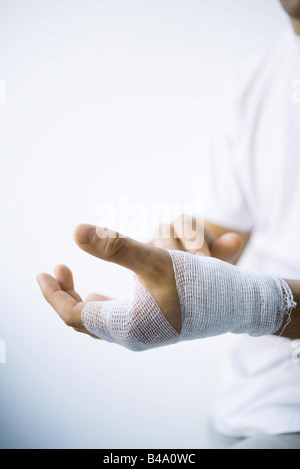 man wrapping his hand with bandage Stock Photo - Alamy