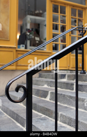 Beautiful black window grille made of iron on a sunny day Stock Photo ...