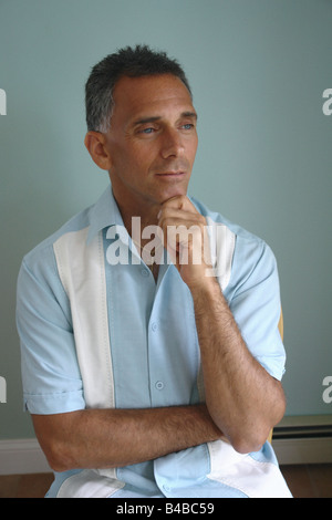 Handsome man with blue eyes wearing striped t-shirt and french beret ...