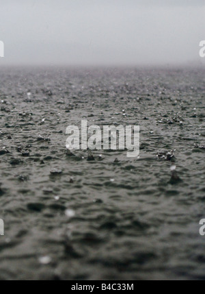 rain drops hitting the sea Stock Photo - Alamy