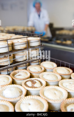 Pies in a pie factory Stock Photo - Alamy