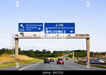 UK motorway signs on overhead gantry - junction 42 of the M1 heading ...