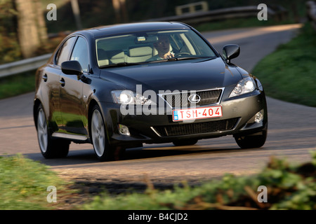 Lexus IS 220d, model year 2005-, black, driving, diagonal from the back ...