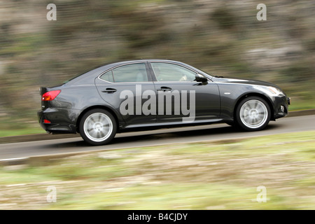 Lexus IS 220d, model year 2005-, black, driving, diagonal from the back ...
