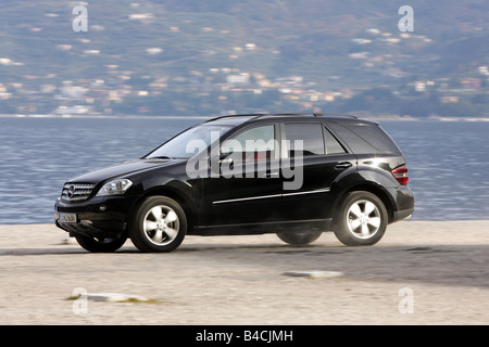 Mercedes ML 320 CDI, model year 2005-, black, driving, diagonal from ...