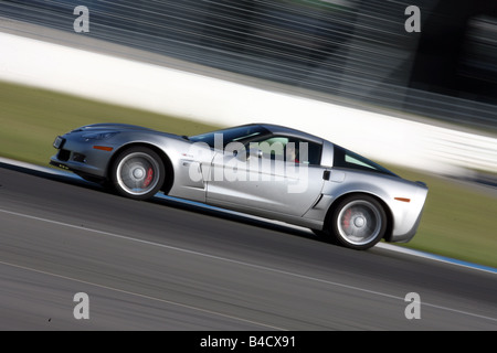 Corvette Z06, model year 2006-, silver, driving, diagonal from the back ...