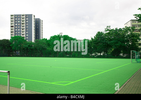 Football pitch with high rise Stock Photo - Alamy