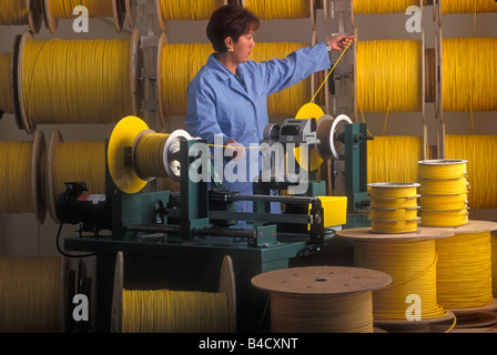 Female cable spooler Stock Photo - Alamy