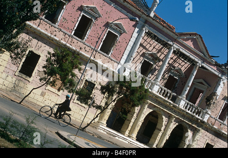 Bullet-riddled building, legacy of civil war in Angola Stock Photo - Alamy