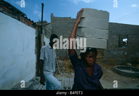 Construction workers in Angola Stock Photo - Alamy