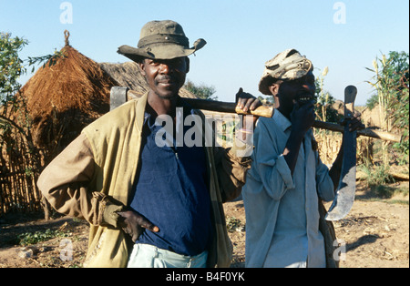 Two men outside traditional hut at Basotho Cultural Village,Qwa Stock ...