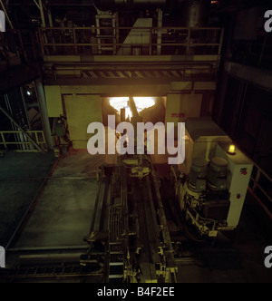 Skimming Slag from Molten Steel Stock Photo - Alamy