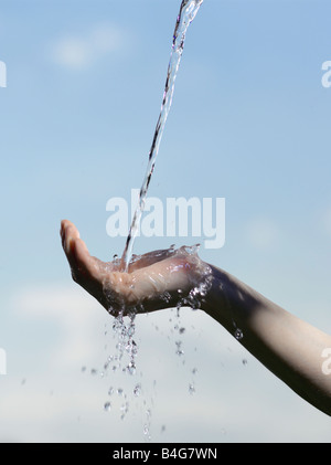 Hand washing by pouring water outdoors Stock Photo - Alamy