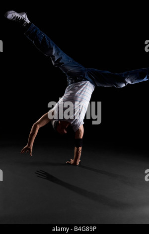 A B-boy doing a One-handed Freeze breakdance move Stock Photo: 20026793 ...