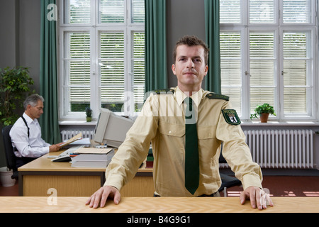 Two police officers working in an office Stock Photo - Alamy