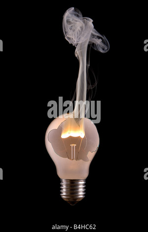 Color photo of light bulb burning out with smoke trapped in glass Stock ...