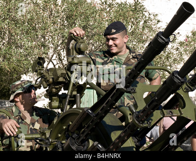 Soldiers demonstrating an Anti Aircraft Gun during an Armed Forces of ...
