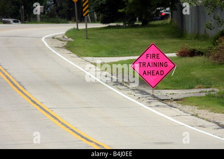 A sign by the Fire Department to notify traffic of fire training ahead ...