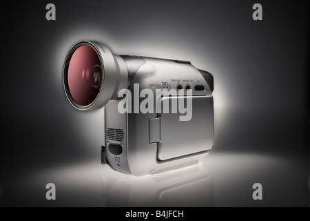 hand held mini DV video camera on white background Stock Photo - Alamy