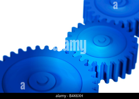 Three interlocking gears, symbol for team play Stock Photo - Alamy