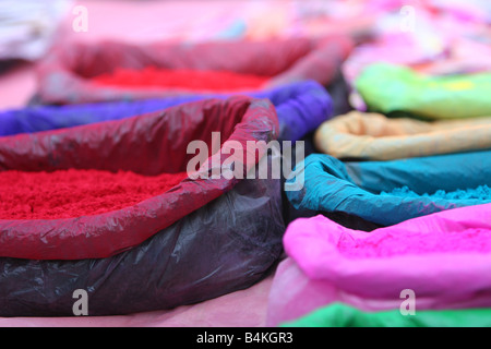 a stall selling Holi paints and dyes at an Indian Market. Photographed ...