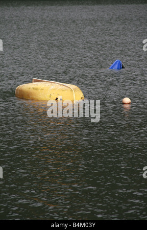 two sinking boats on tourist boating lake Stock Photo - Alamy