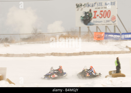 Snowmobile racing action at the I 500 Snowmobile race in Sault Ste ...