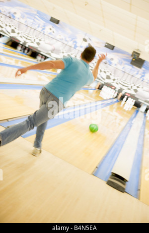 Man Bowling, Rear View Stock Photo - Alamy