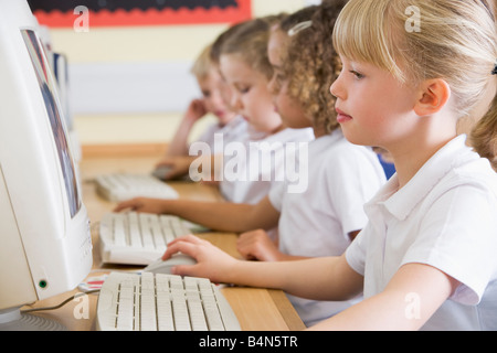 Students learn in a computer lab at a school in Dar es Salaam, Tanzania ...